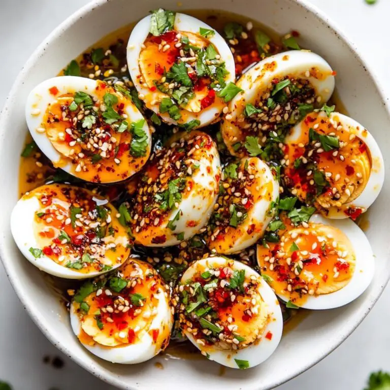 Spicy Chili Garlic Deviled Eggs - SavorySplash