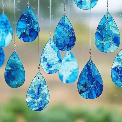 Blue Crayon Raindrop Suncatchers: A Dreamy Craft for Rainy Days & Sunny ...